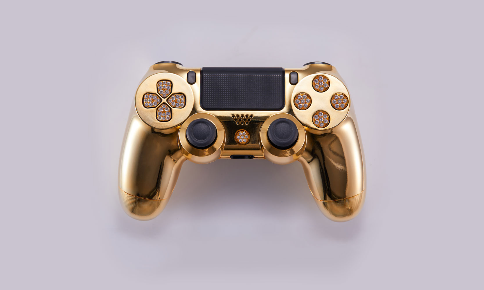 This gold and diamond encrusted PS4 controller will set you back ...
